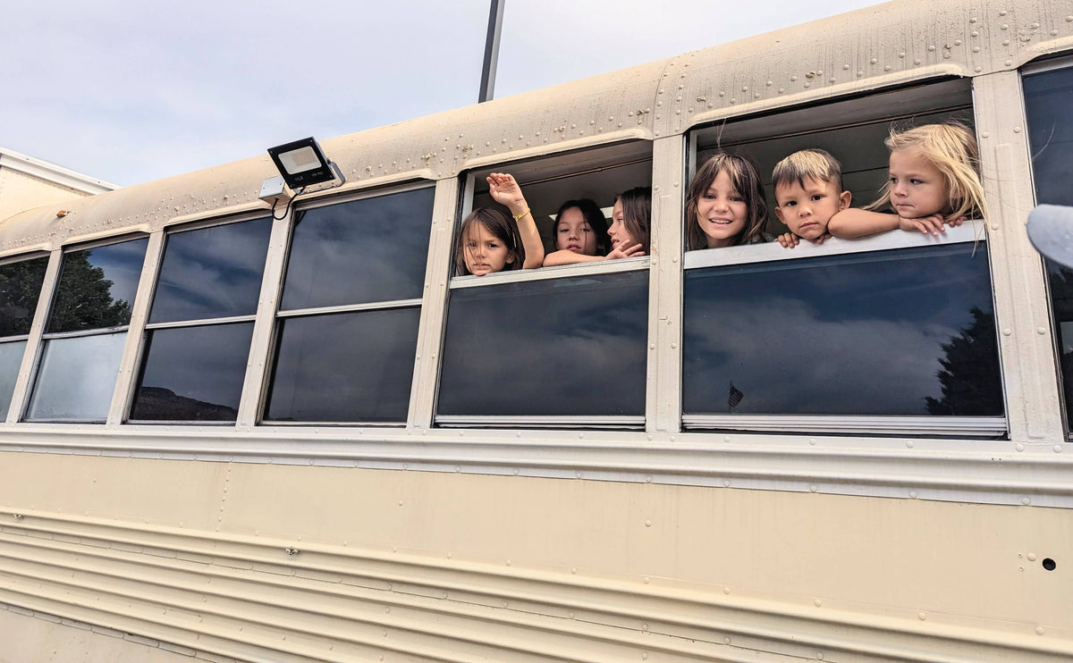 How We Made Our Converted School Bus Cozy for Our Family of 9 | Birdie ...
